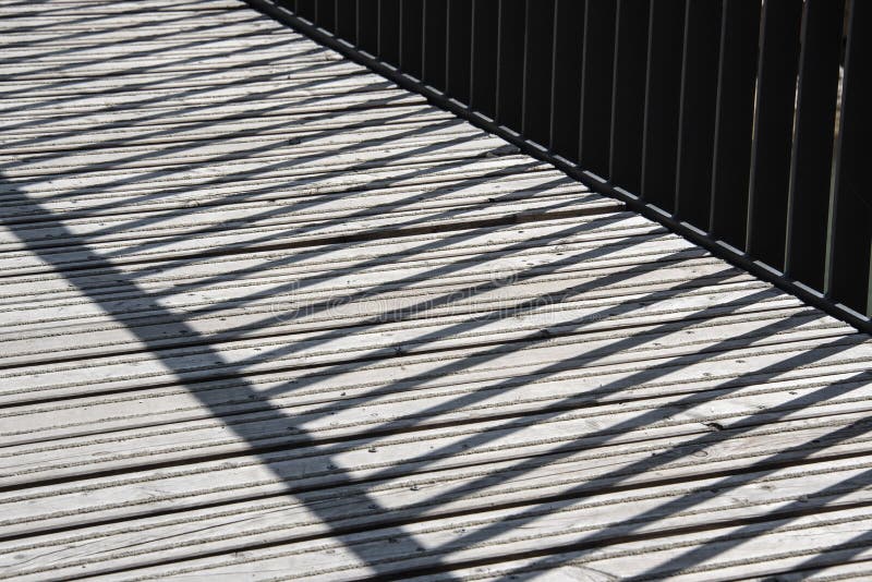 Shadow of the Railing on a Bridge Stock Photo - Image of parallel ...