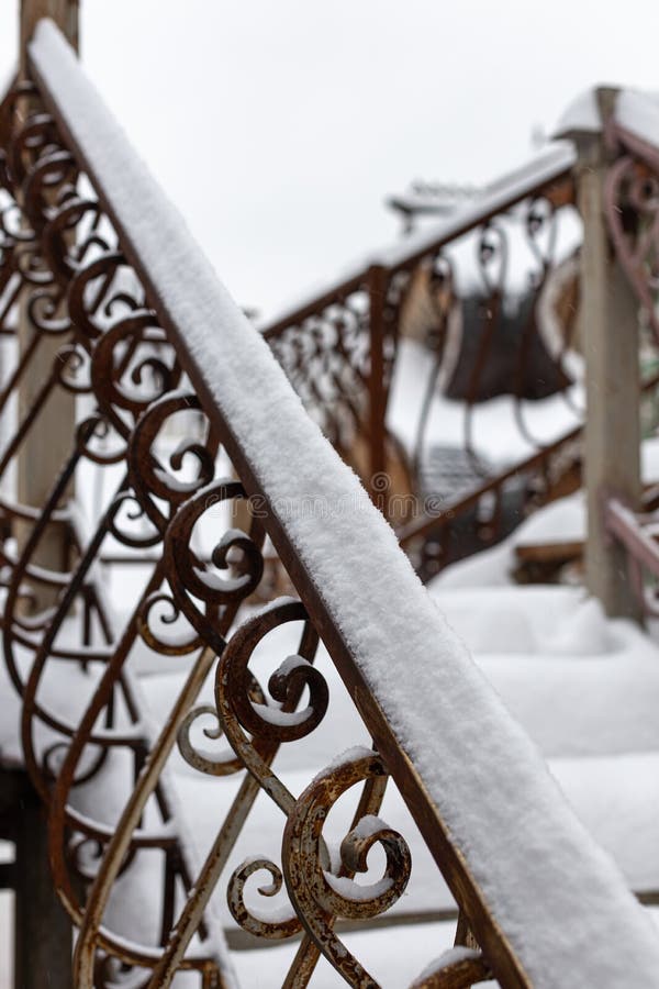 Railing Covered with a Layer of Snow in Winter. Stock Photo - Image of ...