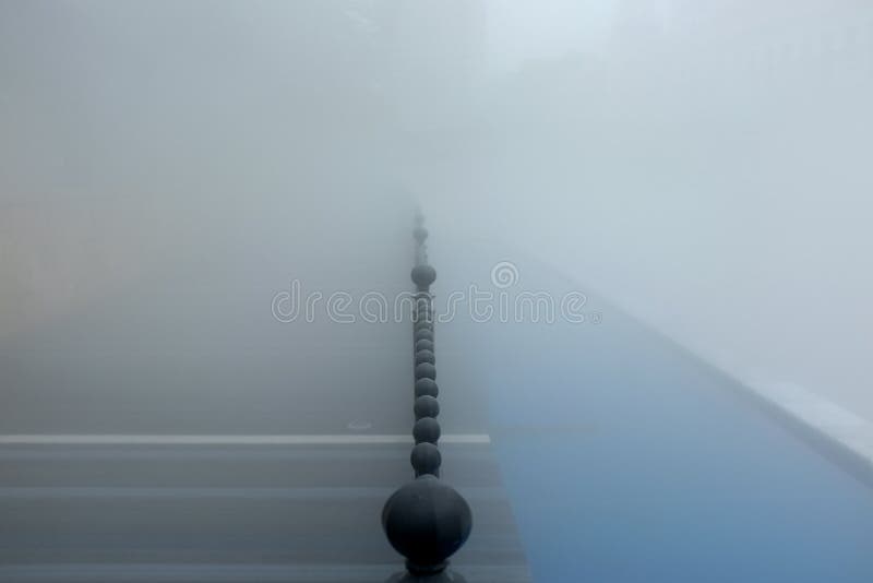 Railing in the mist stock image. Image of disappearing - 242792135