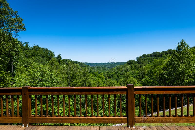 Railing overlooking valley stock image. Image of deck - 97698111