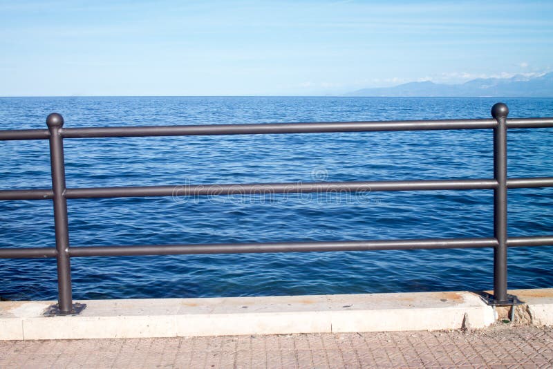 Railing on the sea stock photo. Image of barrier, cloud - 114235200
