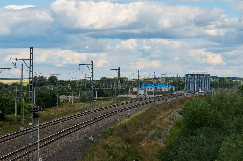 Railroad Bend in Front of a Small Steel Bridge Stock Image - Image of ...