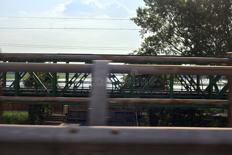 Railroad Bridge with Trees and a Sunset Sky As Background Stock Image ...