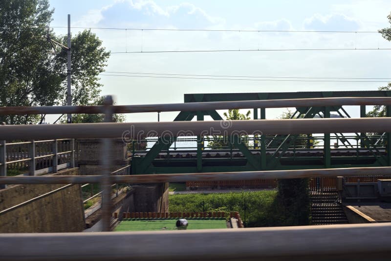 Railroad Bridge with Trees and a Sunset Sky As Background Stock Photo ...