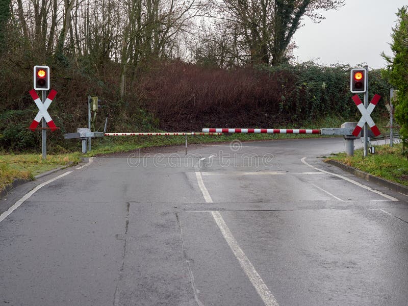 Railroad Crossing with a Closed Barrier and Red Light. Information for ...