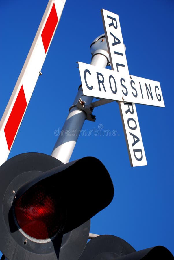 Railroad Crossing Guard and Lights Stock Photo - Image of post ...