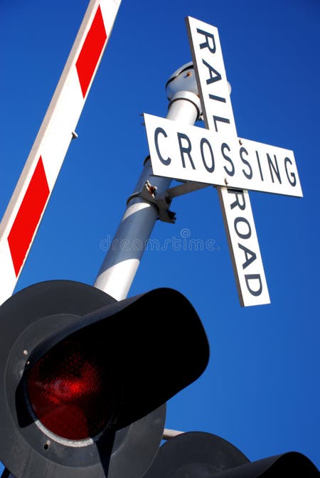 Railroad Crossing Guard and Lights Stock Photo - Image of post ...