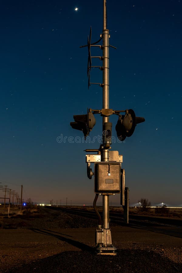 Railroad Crossing Light at Night Stock Photo - Image of light, idaho ...