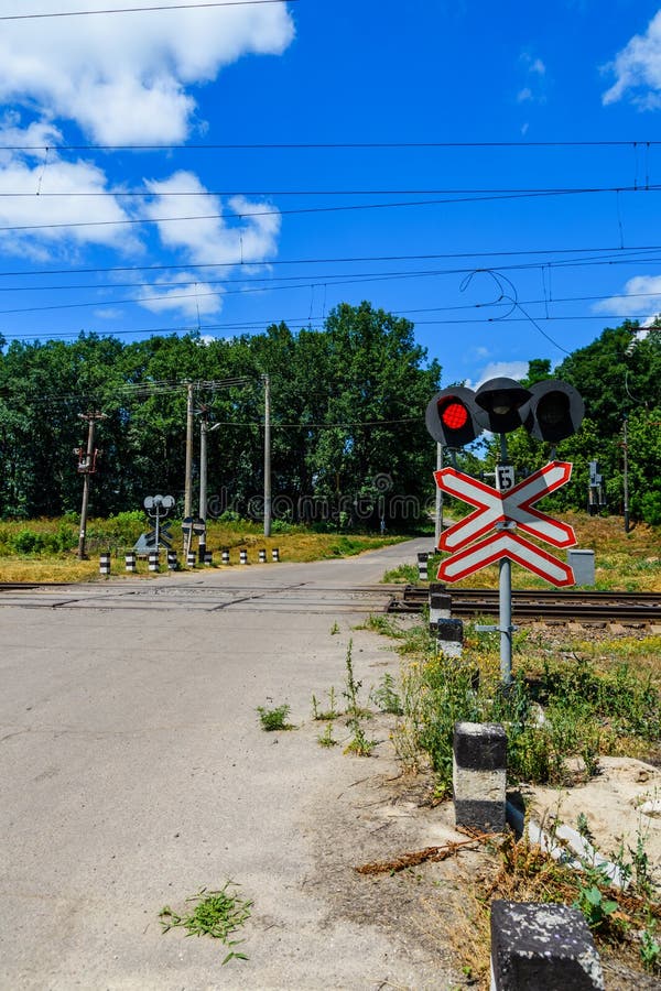 Railroad Crossing Sign and Semaphore in Front of the Railroad Crossing ...