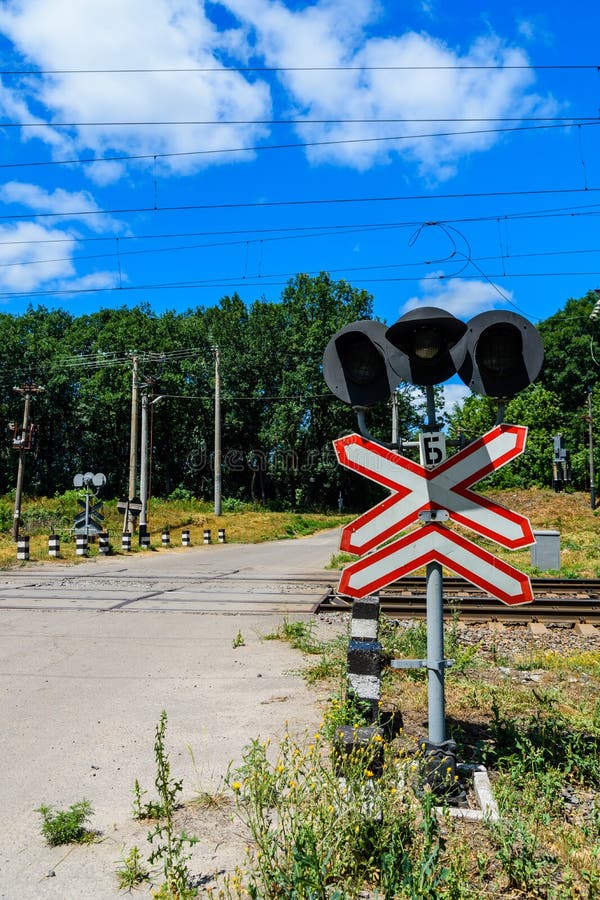 Railroad Crossing Sign and Semaphore in Front of the Railroad Crossing ...