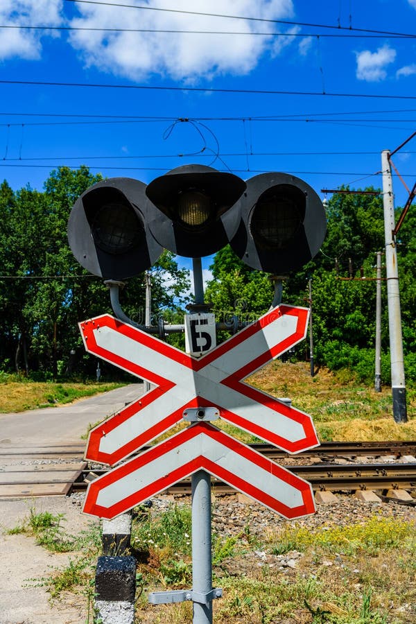 Railroad Crossing Sign and Semaphore in Front of the Railroad Crossing ...