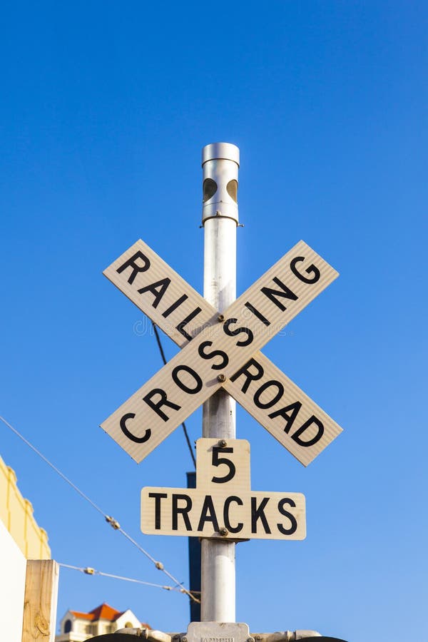 Railroad Crossing Sign Under Blue Sky Stock Photo - Image of road ...