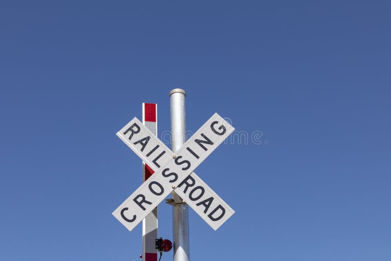Railroad Crossing Sign Under Blue Sky Stock Image - Image of train ...