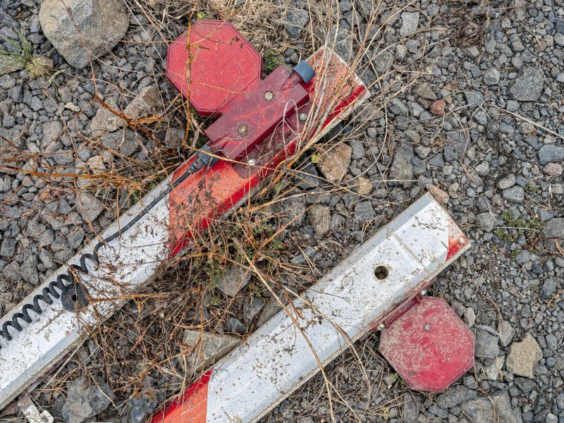 Railroad Gate Arms are Abandoned on the Ground at a Rail Yard Stock ...
