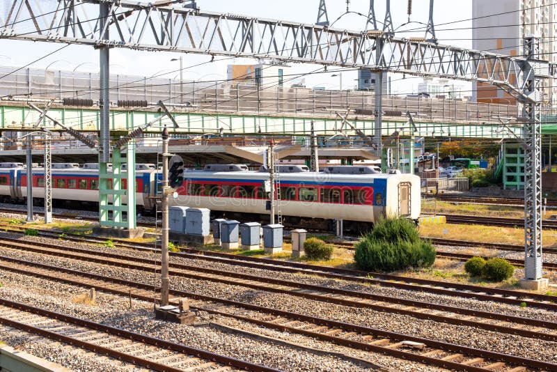 Railroad Infrastructure and Train Passing by. Railway Power Supply ...