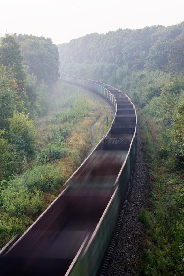 Railroad Landscape. Empty Freight Train Going at Full Speed among Green ...