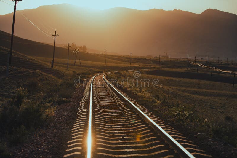 Railroad in the Mountains at Sunset Light Stock Image - Image of sunset ...