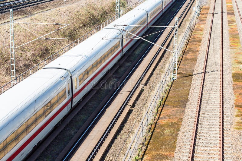 Railroad with moving train stock photo. Image of moving - 73697090