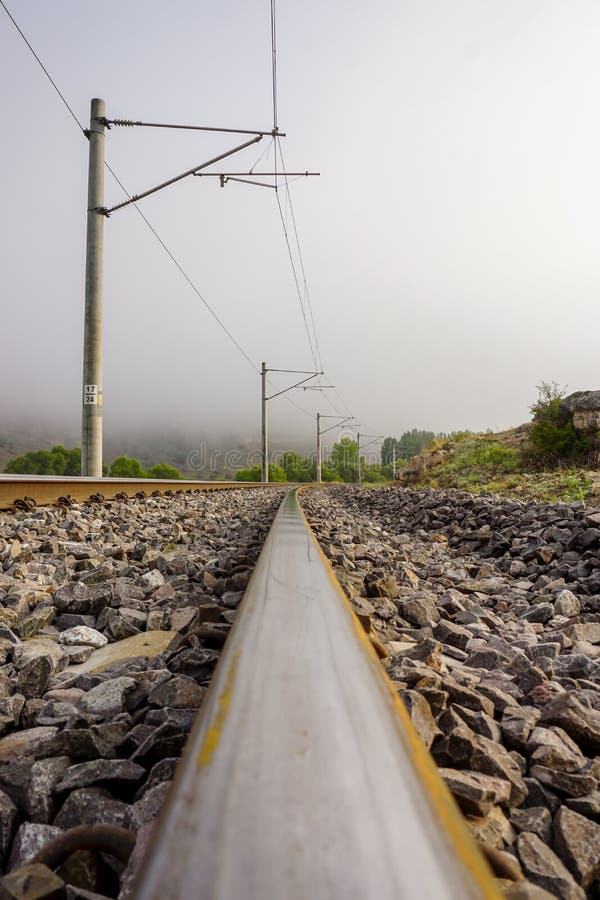 Railroad in the Nature on a Foggy Morning Stock Photo - Image of rails ...