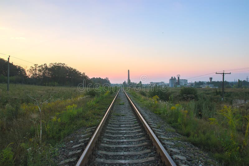 Railroad Near High Voltage Power Lines at Dramatic Sky Stock Image ...