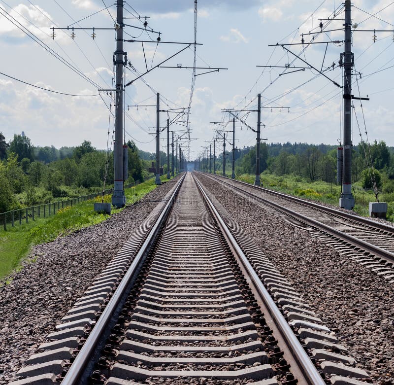 Railroad rails stock image. Image of wires, summer, road - 72148033