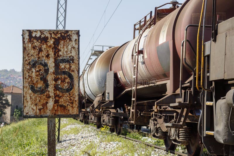 Railroad Sign 35 with Train Passing by Stock Image - Image of ...