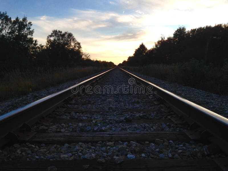 Railroad at Sunset in Canada Stock Photo - Image of blue, sunset: 128049524