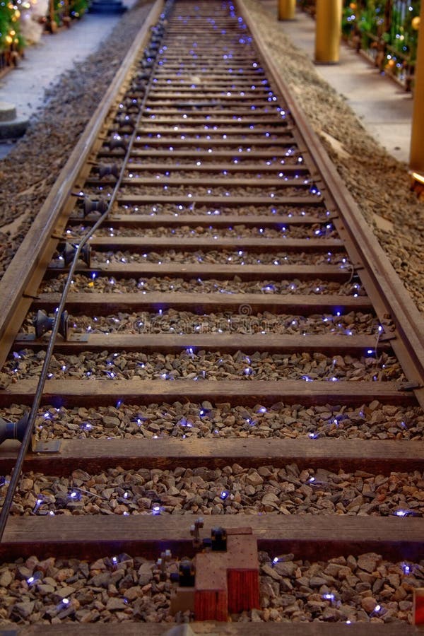 Railroad Track with Christmas Lights Stock Image - Image of diminishing ...