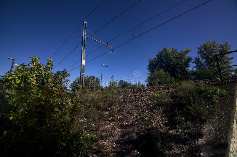 Railroad Track on an Embankment in a Park Stock Photo - Image of bridge ...