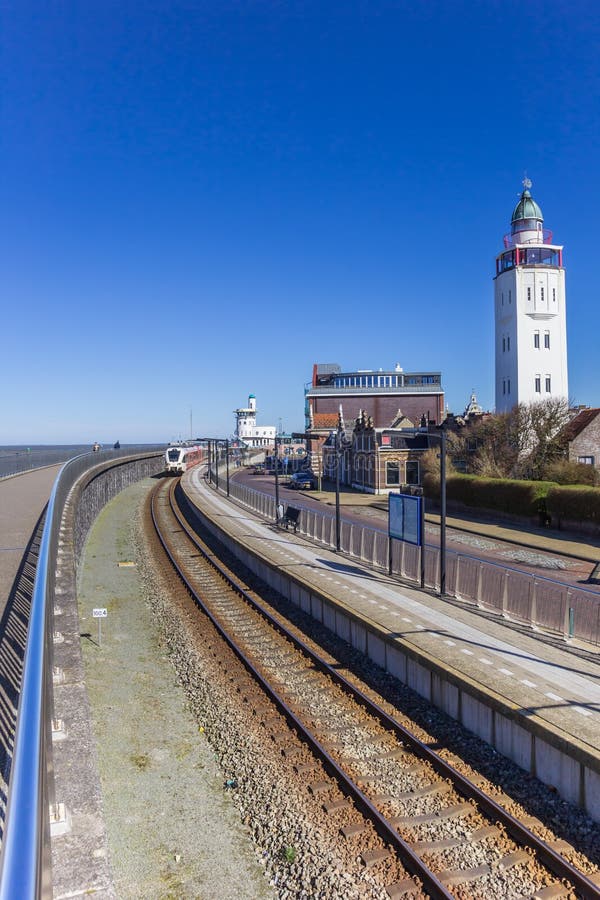 Railroad Track and Lighthouse in the Harbor of Harlingen Stock Photo ...