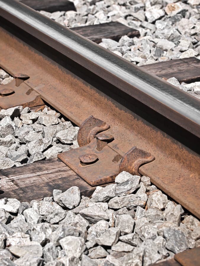 Railroad Track with Rusty Nails Stock Image - Image of industrial ...