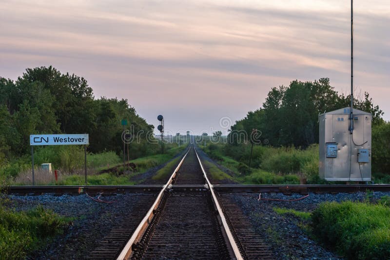 A Railroad Track with a Sign that Says CN Westover Stock Photo - Image ...
