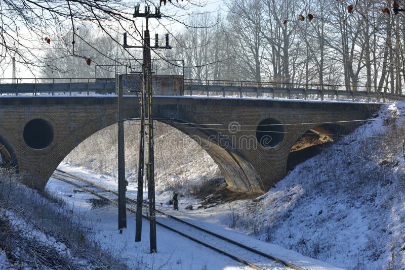 Railroad Tracks and Bridge in Winter Stock Photo - Image of snow ...