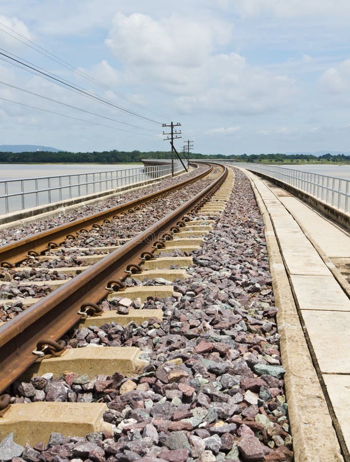 Railroad tracks curving1 stock photo. Image of lake, metal - 20973396