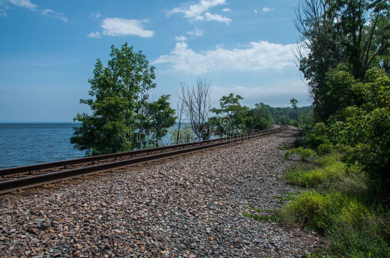 Railroad Tracks on the Edge of Lake Champlain Stock Photo - Image of ...