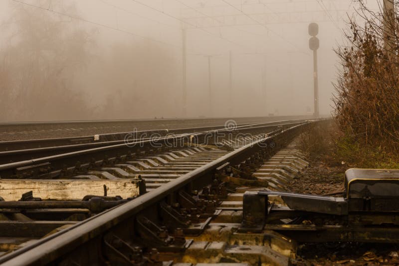 Railroad Tracks in the Fog on Autumn Stock Image - Image of dusk, empty ...