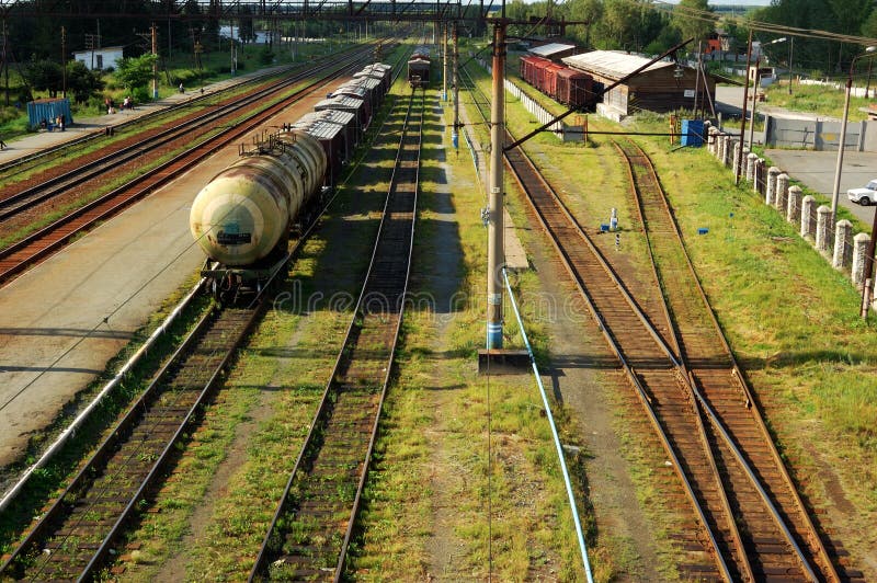 Railroad Tracks and Freight Train Stock Photo - Image of depot, commute ...
