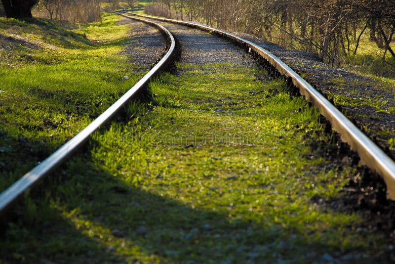 Railroad Tracks Going Around the Corner Stock Image - Image of bush ...