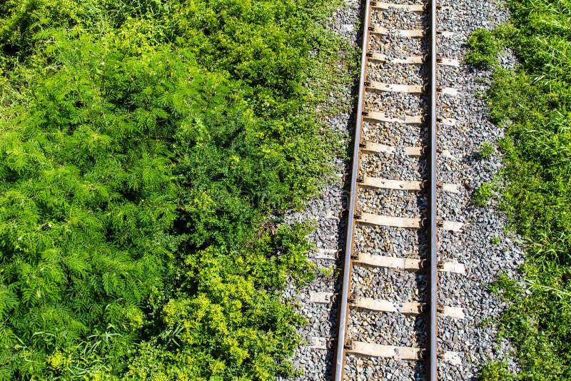 Railroad tracks grass stock image. Image of side, gravel - 43761041
