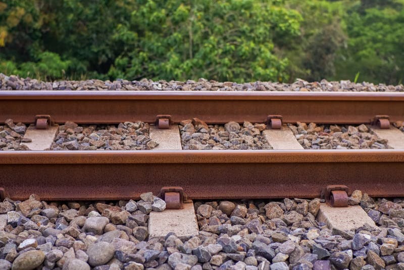 Railroad Tracks on Gravel. Rusty Railroad Steel Stock Image - Image of ...