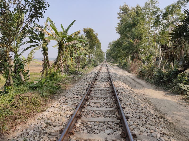 Railroad Tracks in the Middle of Village Stock Photo - Image of ...