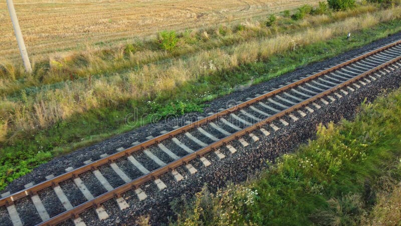 Railroad Tracks, Road for Train Across the Field. Stock Photo - Image ...