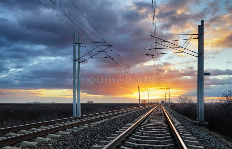 Railroad Tracks in the Setting Sun Stock Image - Image of setting ...
