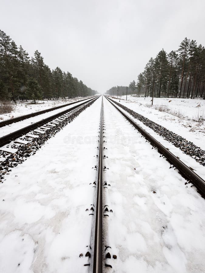 Railroad Tracks in Snowy Winter Day Stock Photo - Image of track, space ...