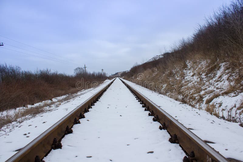 Railroad tracks in winter stock image. Image of perspective - 59928195
