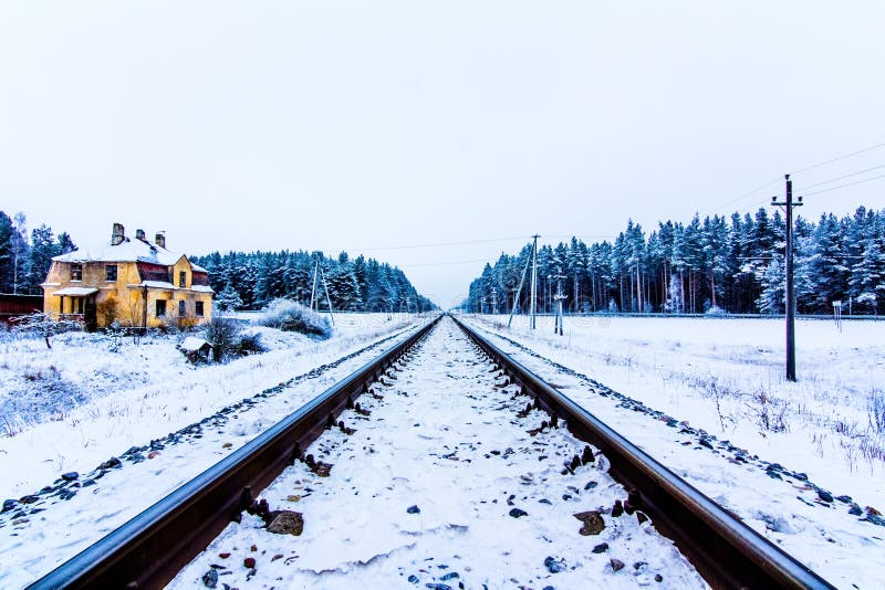 Railroad Tracks in Winter Snow Yellow House. Stock Photo - Image of ...