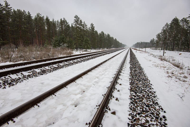 Railroad Tracks in Winter Under Snow Stock Image - Image of wood ...