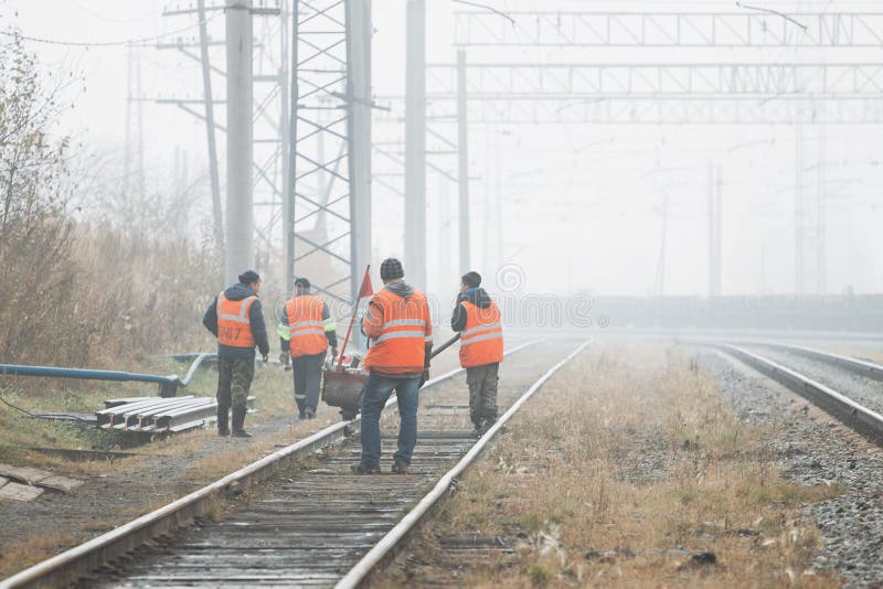 Railroad Workers Maintaing Railways Editorial Photo - Image of outdoor ...