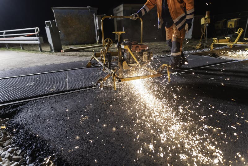 Rails Dragging on a Crosswalk Stock Photo - Image of metal, shift ...
