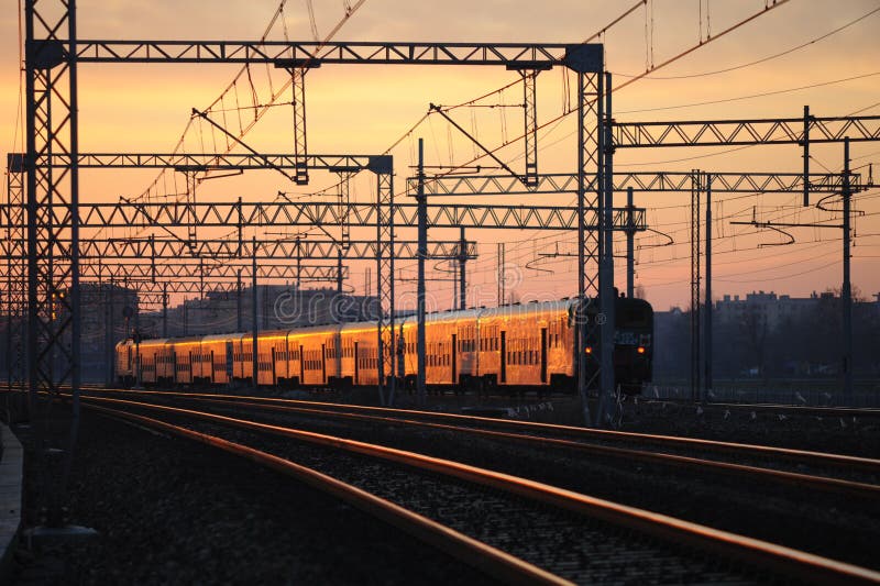 Rails Illuminated by the Setting Sun Stock Image - Image of pylons ...